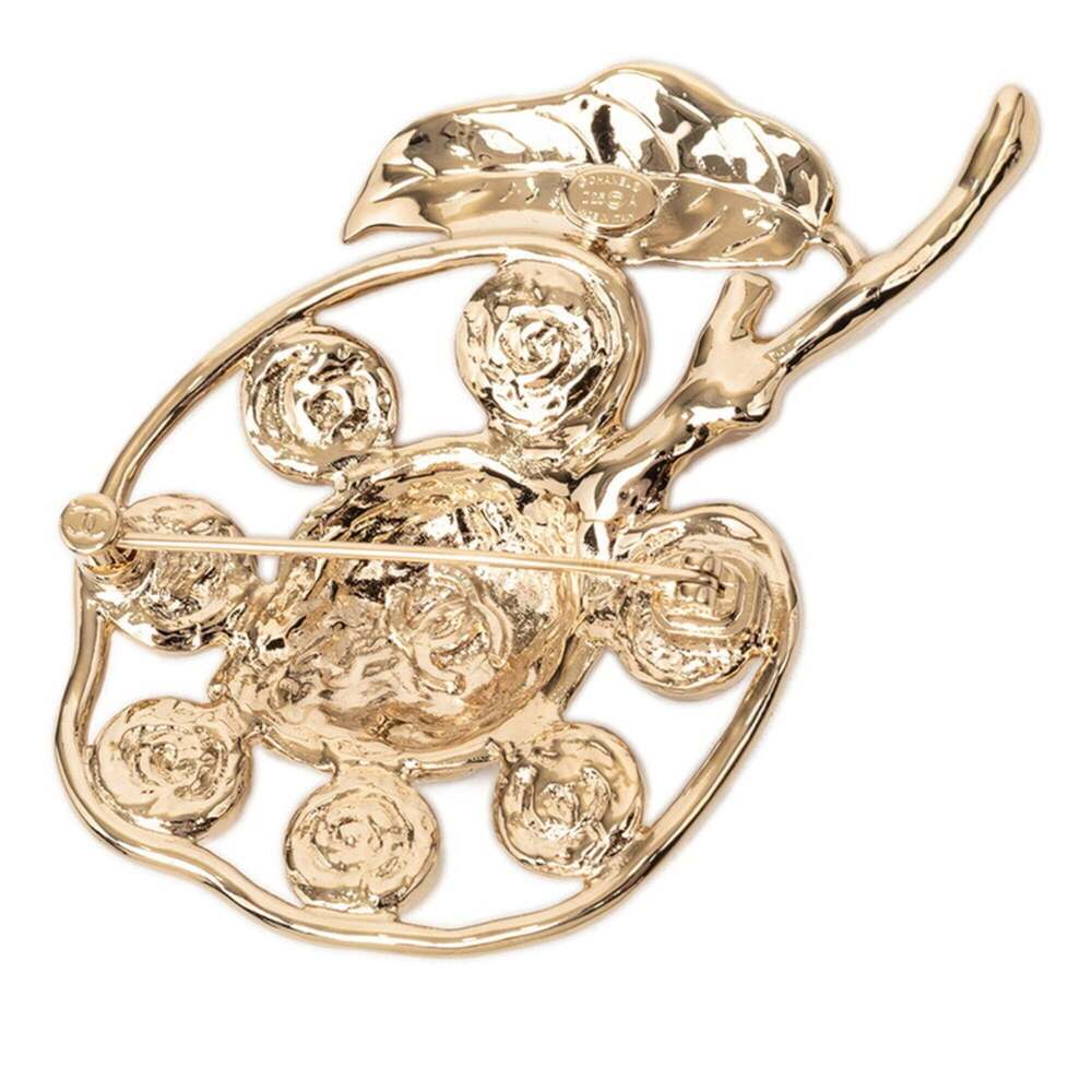 CHANEL | Jewelry | Chanel Purple Logo Brooch | Poshmark